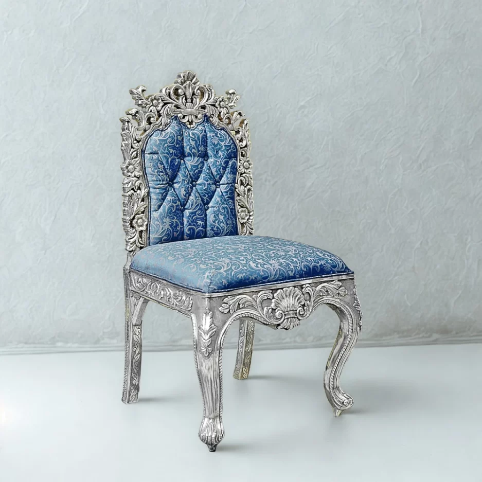 Silver Clad Chair made of teak wood with hand carving